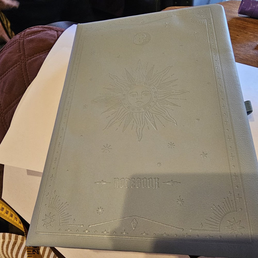 grey blue sunburst journal – Bliss Marketplace